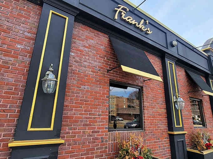 Those classic brick walls and golden accents create the perfect backdrop for Cambridge's most beloved steakhouse tradition.