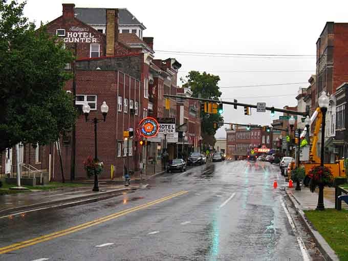 Rain-slicked streets reflect the warm glow of a mountain town that's weathered every storm with grace.