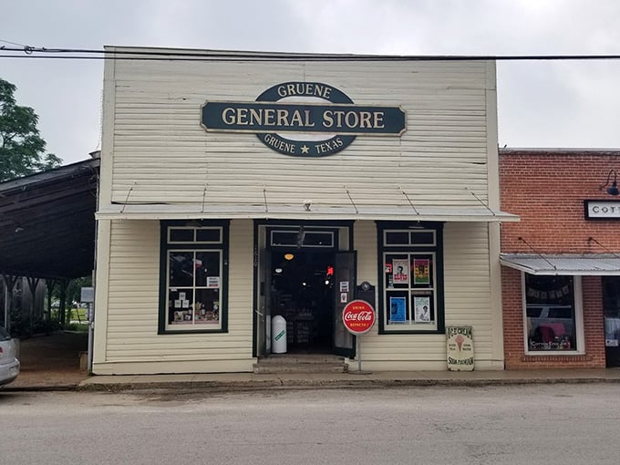 That classic Coca-Cola sign beckons like a lighthouse guiding you safely back to simpler, sweeter times gone by.