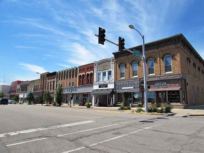 Sunlight dances across this timeless downtown where architectural details reveal craftsmanship from another era entirely.