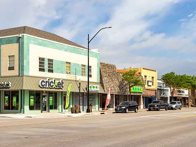 Classic storefronts line the street where local businesses have served neighbors for decades with genuine small-town hospitality and care.