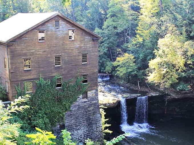 That weathered mill standing beside the falls looks like it wandered straight out of an Andrew Wyeth painting. 