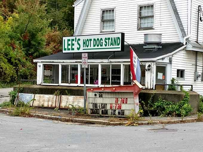 Lee's weathered foundation and patriotic flag tell stories of countless satisfied customers through the changing seasons.