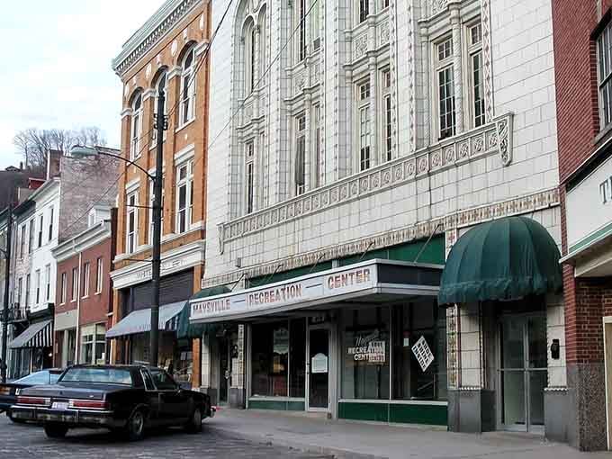 Classic storefronts line up like old friends, each one telling stories through their weathered brick and careful restoration.