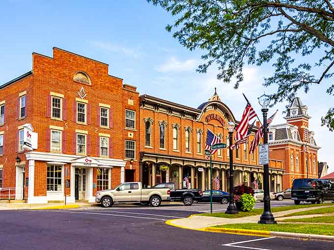 Red brick buildings and American flags create a scene so perfect you'll swear you've stepped into Mayberry.