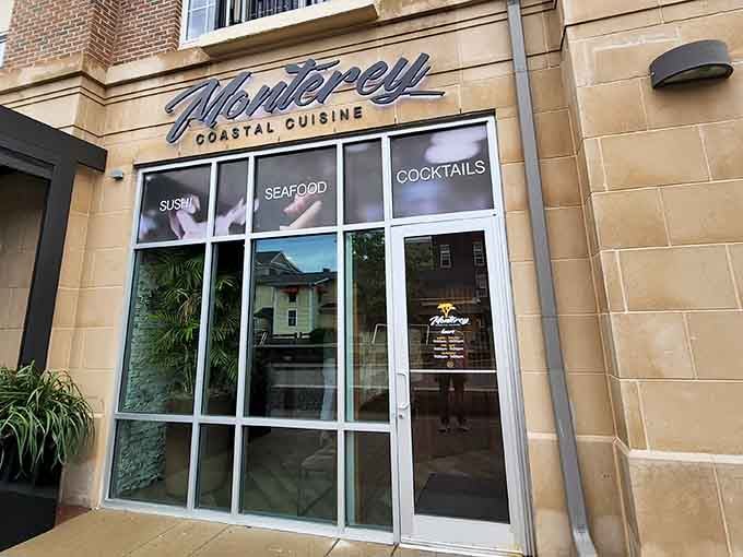 Those elegant script letters and clean glass doors whisper sophistication while promising sushi, seafood, and perfectly mixed cocktails.