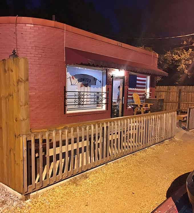 That cozy patio with Adirondack chairs proves great steakhouses don't need valet parking to be memorable.