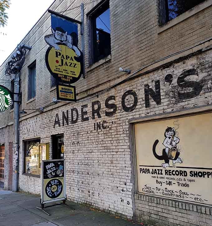 That cool cat logo and vintage signage make you want to step inside and lose yourself in the bins.