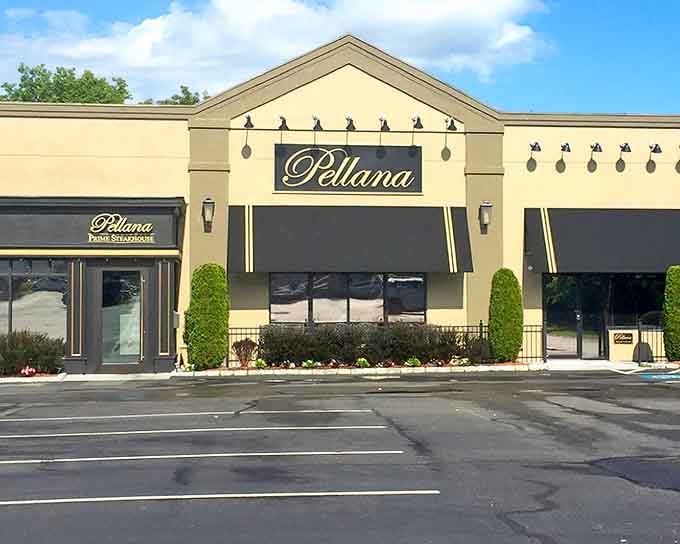 Those decorative silhouettes along the roofline add a playful touch to this polished exterior where serious steak lovers gather regularly.