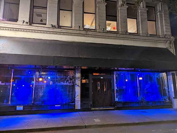 When those blue lights glow at night, you know something wonderfully theatrical is happening behind these elegant walls.