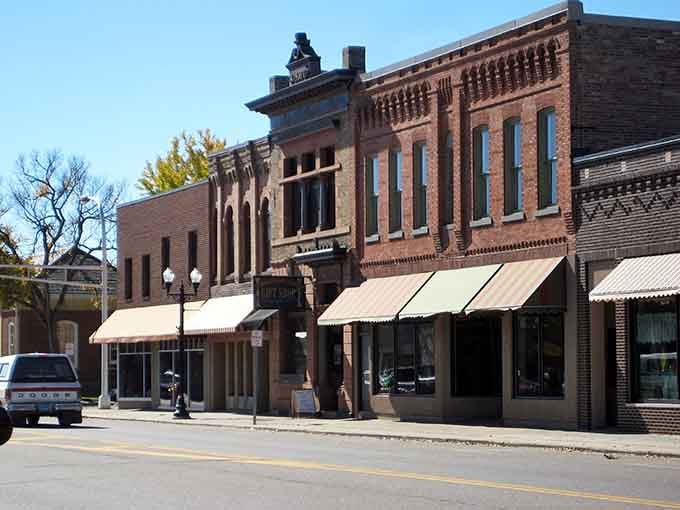 Brick buildings with character line streets where people still take time to chat with neighbors.
