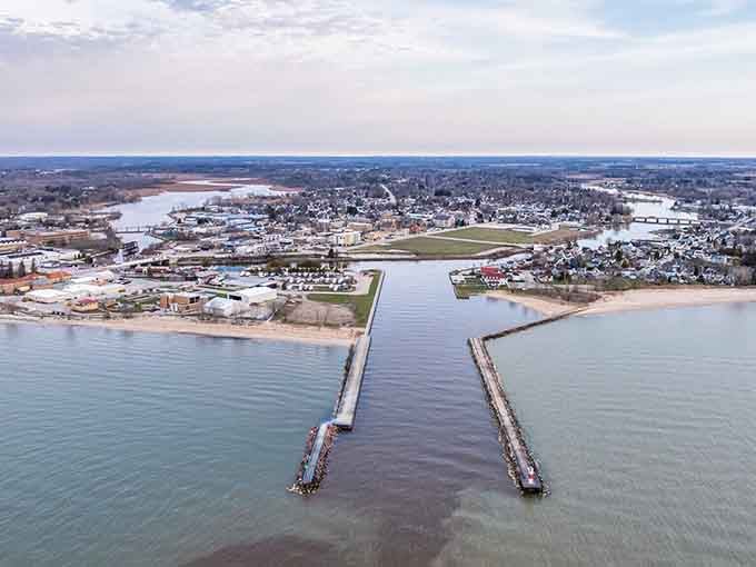 Lake Michigan stretches endlessly beyond this waterfront community where retirement dreams meet affordable reality every single day.