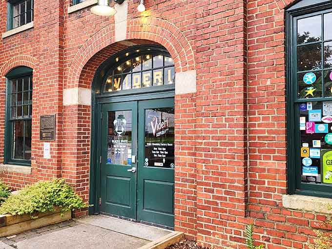 The arched doorway frames your entrance into a world where cocoa beans become edible art.