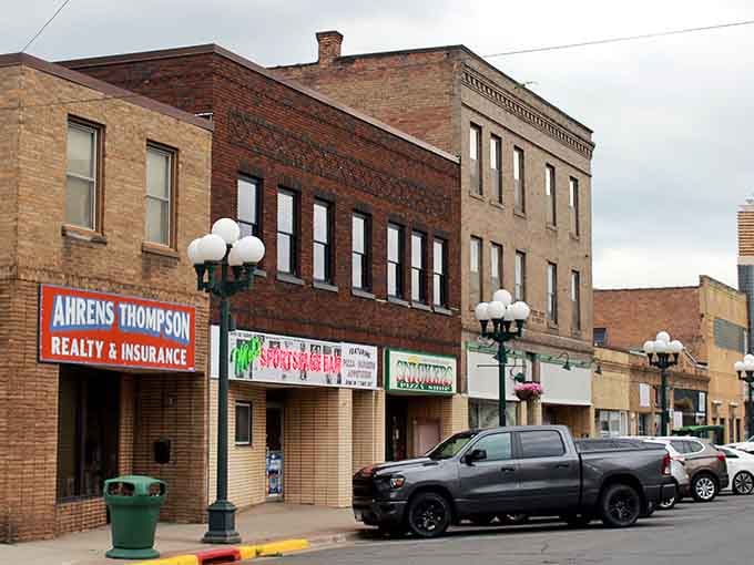 These historic facades have weathered generations, standing strong like the families who built this community.