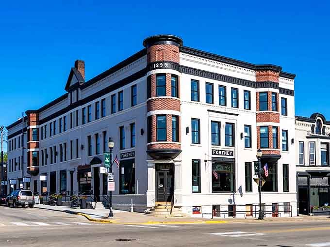 That corner building with the turret shows off architecture they just don't make anymore, standing proud against blue skies.