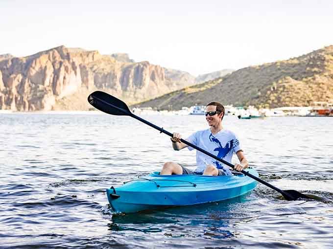 Daytime kayaking is lovely, but it's just the opening act for what happens after sunset around here.