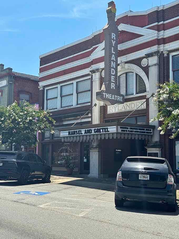The Rylander Theatre stands proud like a time capsule that still works, hosting shows and reminding us entertainment once had style.