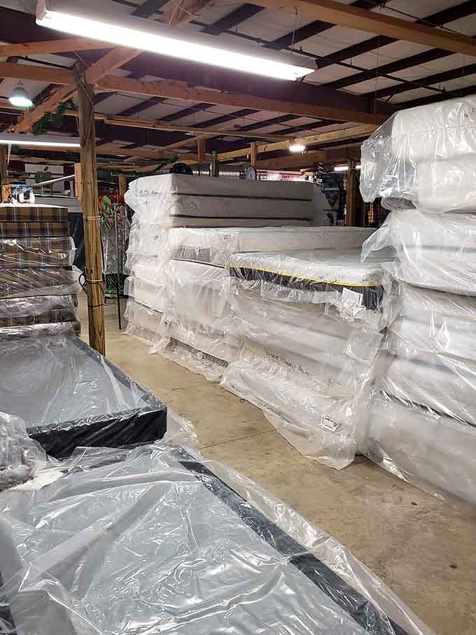 Stacks of wrapped mattresses tower like the world's most comfortable game of Jenga, ready to revolutionize your sleep.