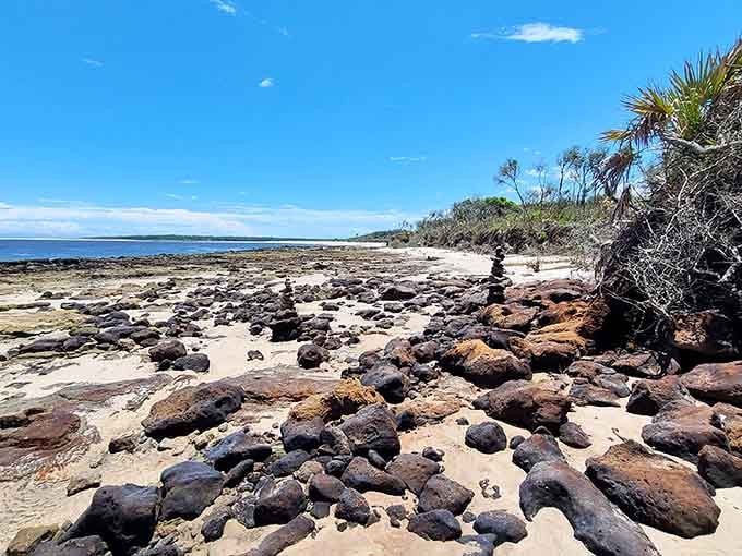 Ancient coquina rocks dot the shoreline, creating a moonscape that's surprisingly close to civilization.