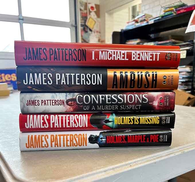 James Patterson thrillers stacked high, ready to fuel your next beach day or sleepless night of reading.