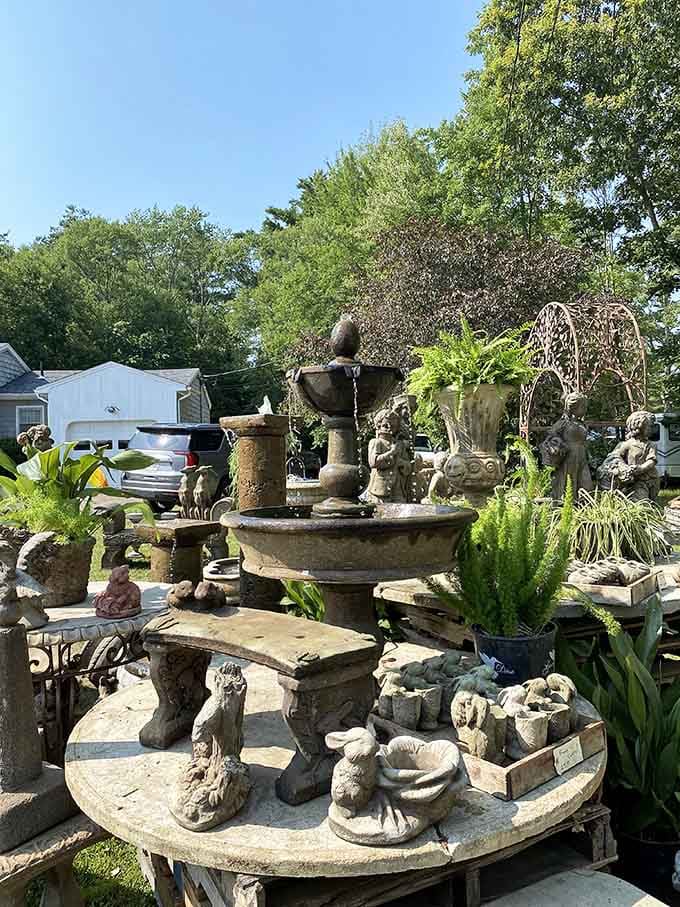 Garden fountains and weathered statuary create an outdoor museum that would make any landscape designer weep with joy.