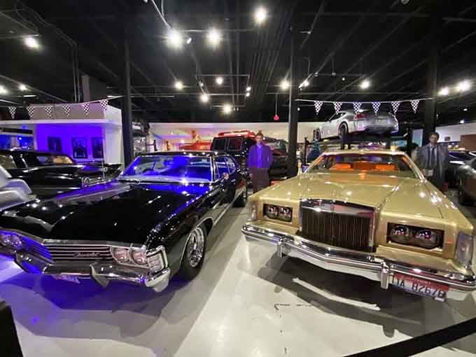 Rows of legendary vehicles create an automotive timeline spanning generations of pop culture history.