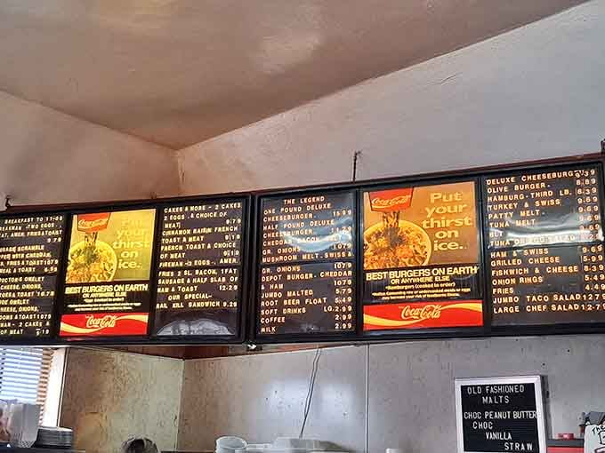 The menu boards promise delicious possibilities, from classic burgers to breakfast specials that'll start your day right.