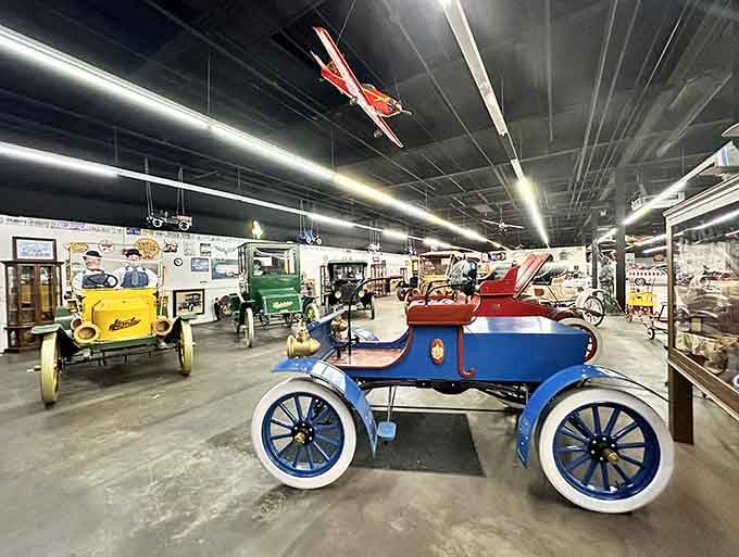 Vintage automobiles gleam under museum lights, each one a testament to American engineering and automotive dreams of yesteryear.