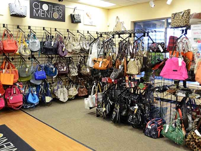 This handbag wall holds more designer dreams than a fashion magazine's entire editorial staff combined.