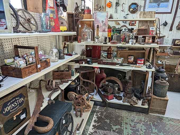 Rustic tools and vintage finds line these shelves like artifacts in the world's most touchable museum.