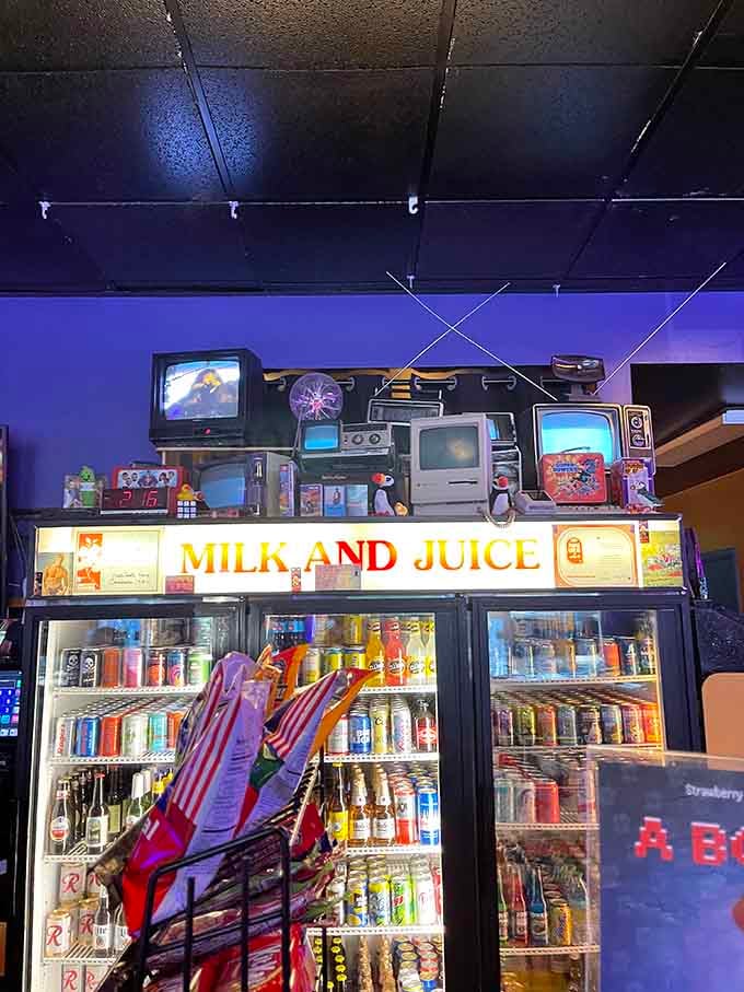 That "Milk and Juice" sign above the cooler is pure genius, because responsible gaming requires proper hydration.