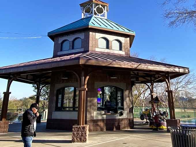 This charming ticket booth looks like it time-traveled from a frontier town, minus the tumbleweeds and gunfights.