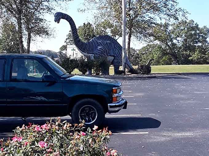 That moment when a long-necked dinosaur casually greets you in the parking lot sets the tone perfectly.