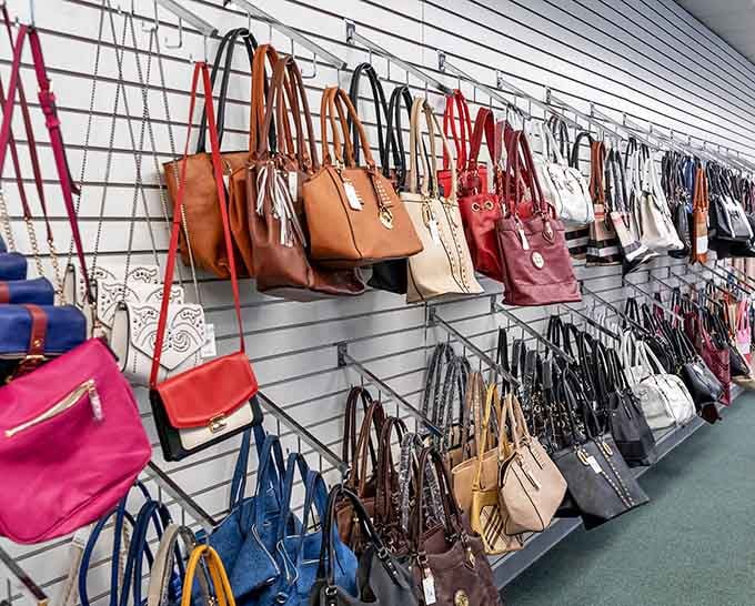 This rainbow wall of handbags offers more color options than a box of crayons from your childhood.
