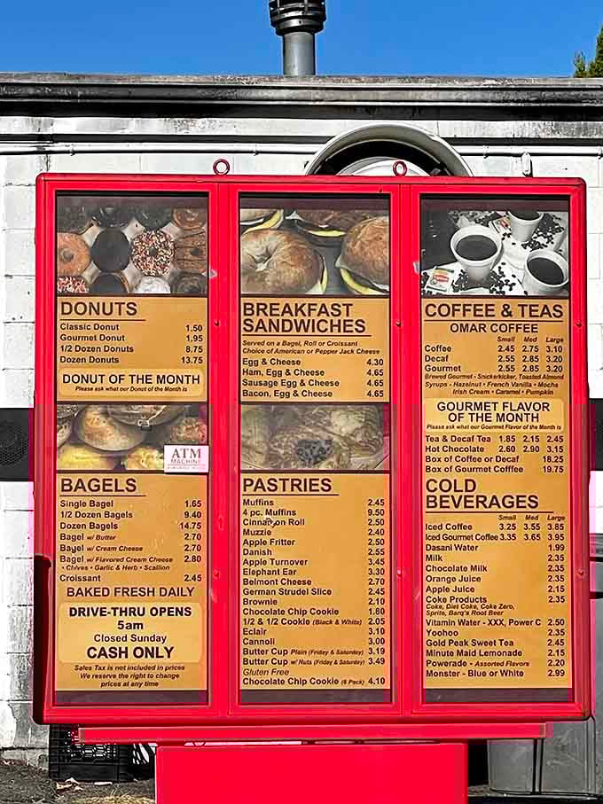 This menu board tells the whole delicious story: donuts, bagels, breakfast sandwiches, and pure temptation.