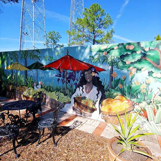 Vibrant murals transform ordinary walls into tropical art galleries, because who says gardens can't have personality?