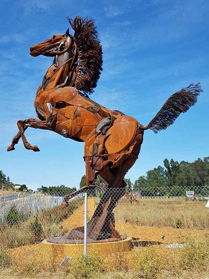 Rearing up like Roy Rogers' Trigger got a steampunk makeover, this metal stallion commands attention with every welded muscle.