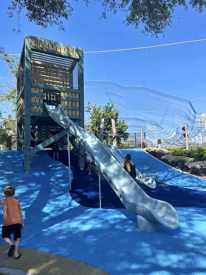 That slide tower stands tall like a maritime lighthouse, ready to launch kids into pure joy and mild parental panic.
