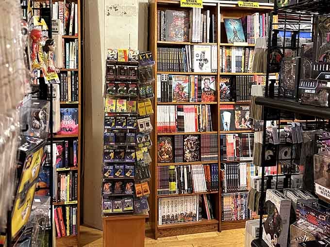 Floor-to-ceiling shelves of graphic novels prove that comic books grew up, even if we happily refused to do so.
