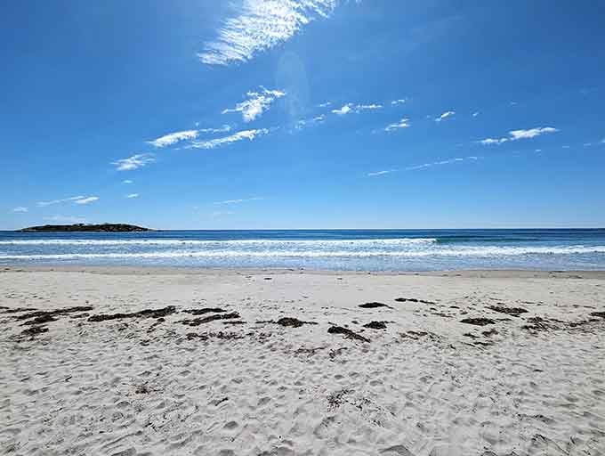 Soft sand and gentle waves rolling in under wispy clouds, this is what retirement dreams are made of, friends.