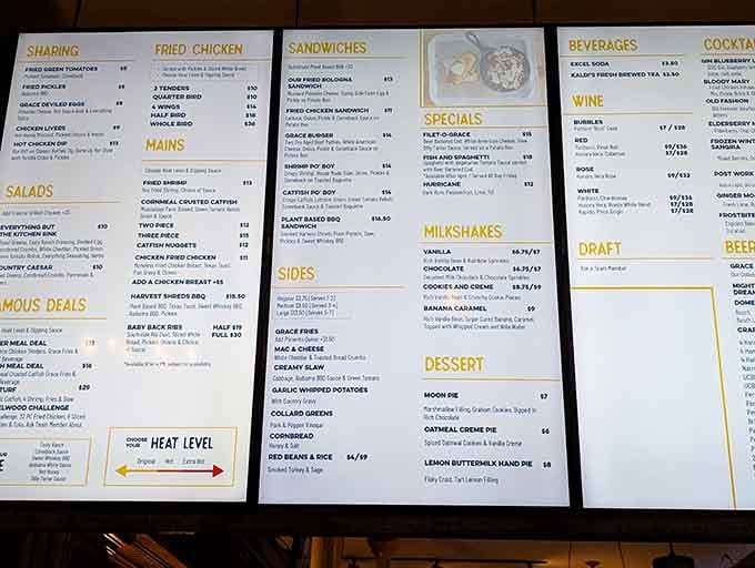 The menu board spells out your delicious destiny: pick your protein, choose three sides, and prepare for happiness.