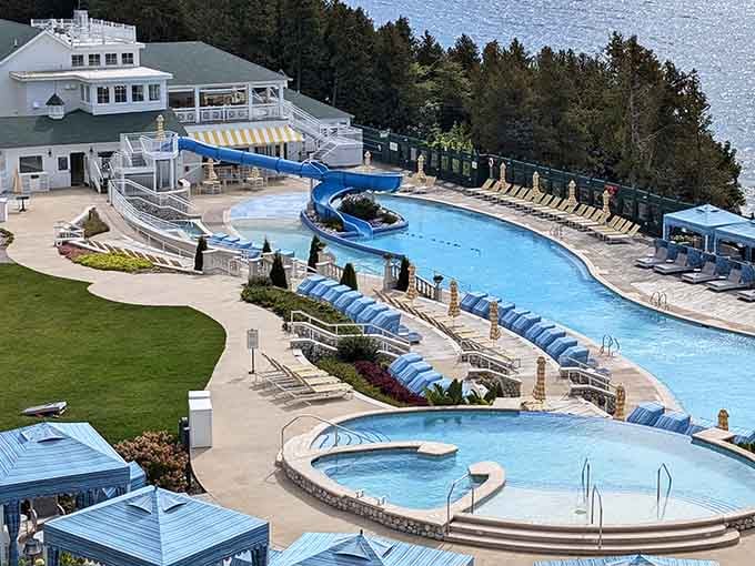 That serpentine pool with its water slide proves fancy hotels know how to have fun, overlooking the Straits magnificently.