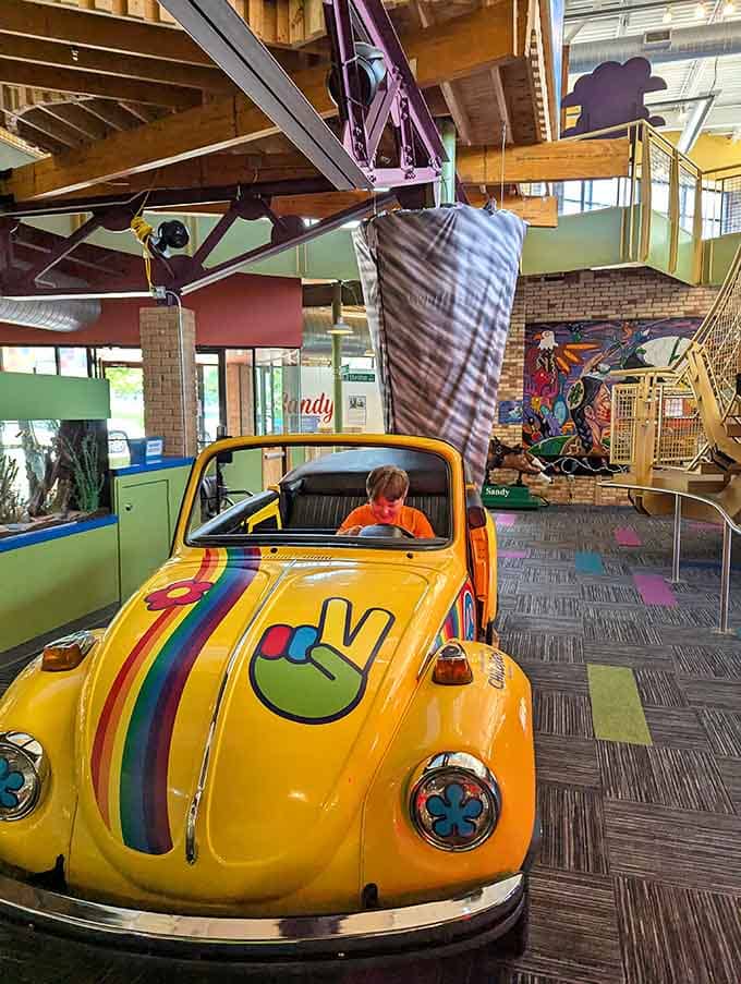 That groovy yellow ride channels pure 1970s joy, complete with rainbow stripes and a peace sign for good measure.