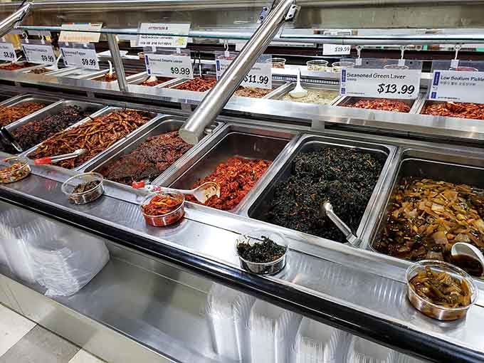 The banchan bar displays a rainbow of Korean side dishes that'll make you rethink everything about meal planning.