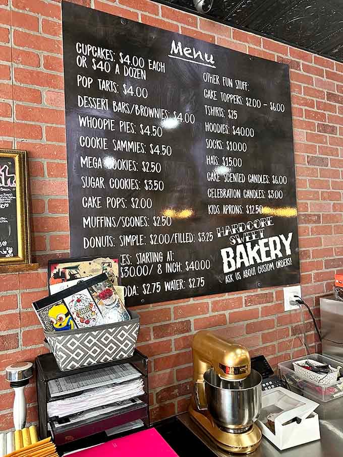 This menu board speaks fluent dessert, offering everything from whoopie pies to mega cookies in delightful chalk-scrawled glory.