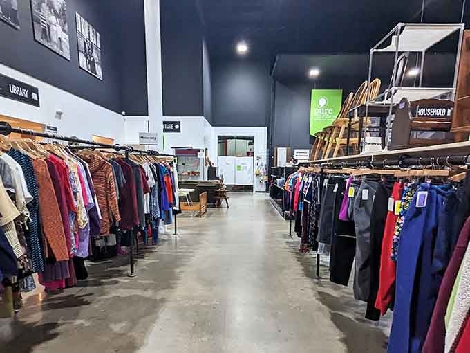Those soaring ceilings and organized racks look more like a boutique than a secondhand shop, honestly.