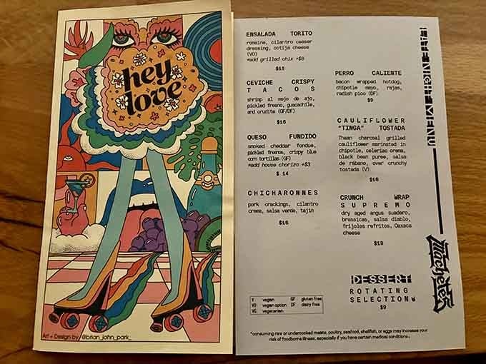 That colorful menu cover promises adventure, and the rotating selections inside absolutely deliver on it.