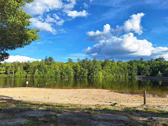 Sand Spring Lake's beach looks like someone airlifted a slice of summer vacation right into the Pocono Mountains.