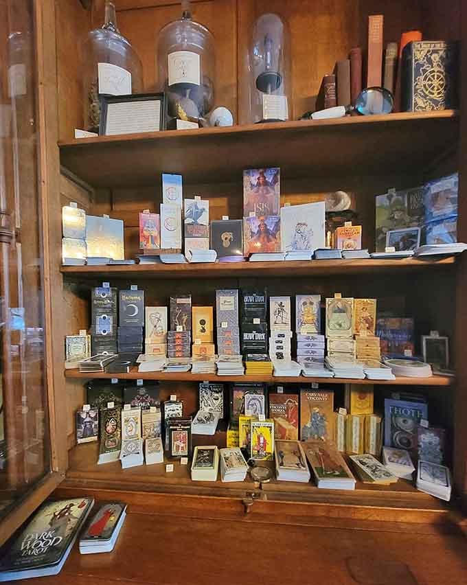 Tarot decks stacked like precious manuscripts, because your future deserves better than a gas station card reading.