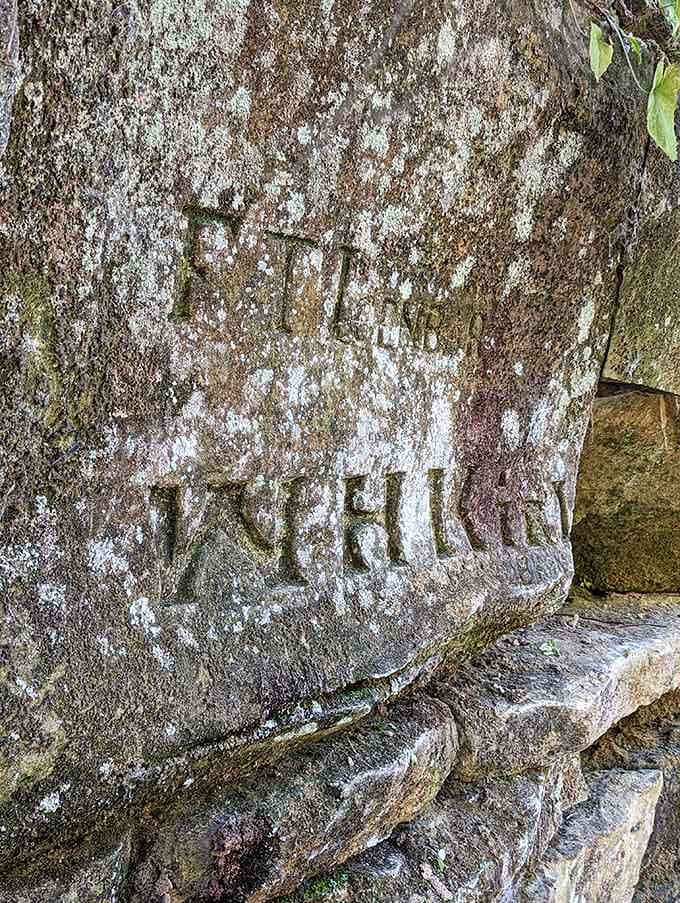 Someone carved their mark into history here, a reminder that humans have treasured this spot for generations.